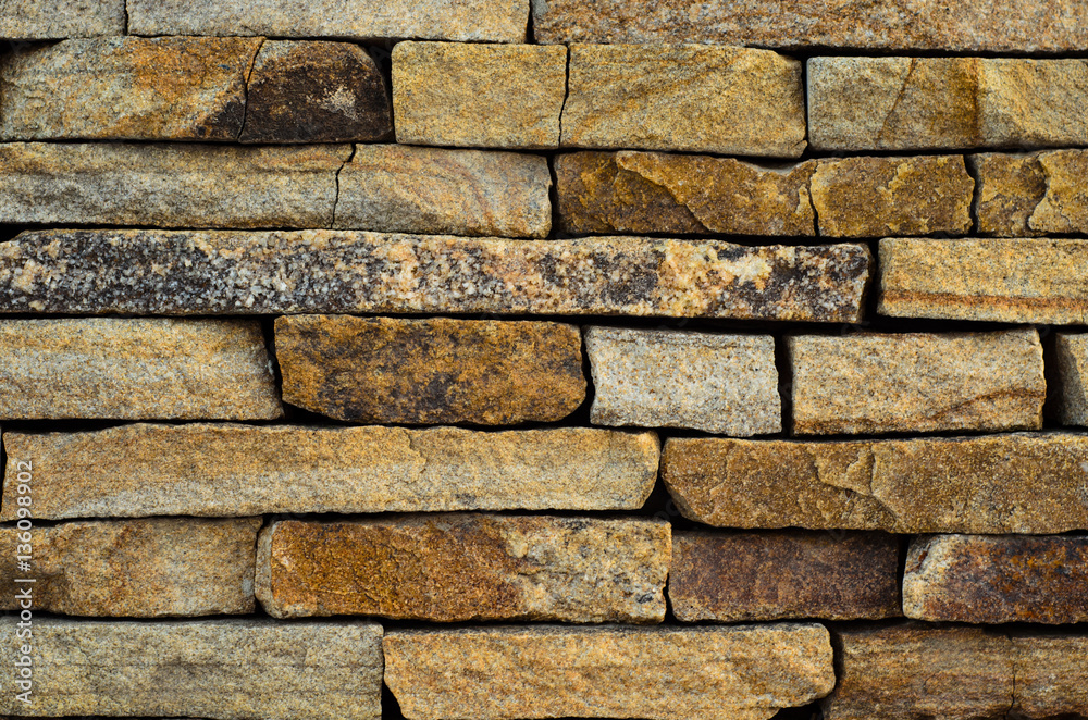 Texture of the fence made from tiles of sandstone Stock Photo | Adobe Stock