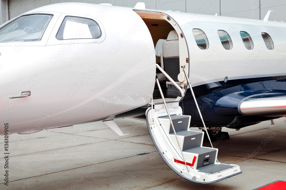 Ladder with open door in business jet airplane фотография Stock | Adobe ... Ladder with open door in business jet airplane фотография Stock | Adobe ...