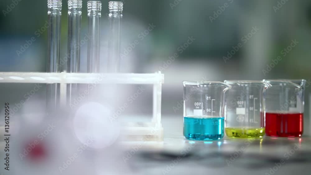 Lab flasks and measuring cups in medical laboratory. Research ...