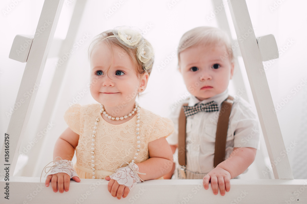 two babies wedding - boy and girl dressed as bride and groom Stock ...