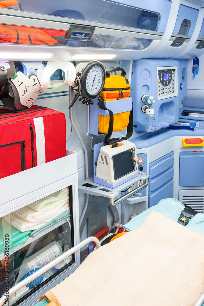 Inside the ambulance, view from the sanitary compartment. Different ...
