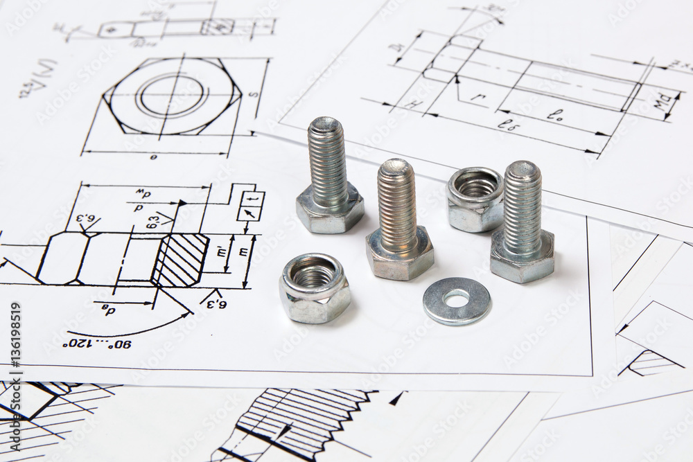 Printed engineering drawings, nuts and metal bolts. 스톡 사진 | Adobe Stock