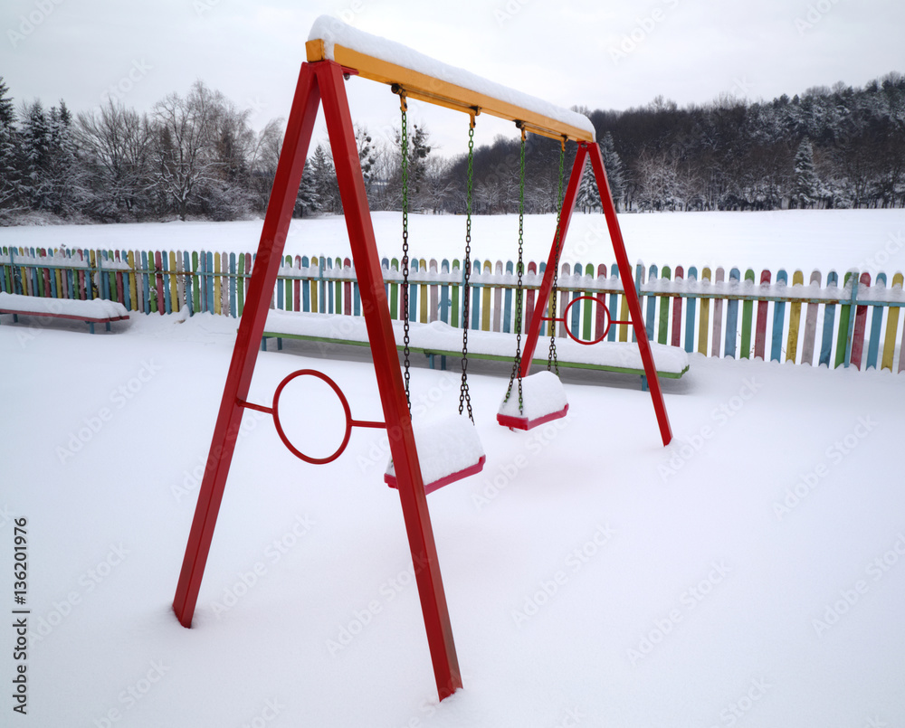 Children's playground covered with snow in winter Stock Photo | Adobe Stock