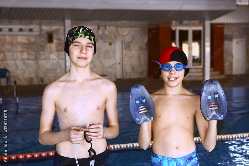 teenager boys swimmer in swimming pool Stock Photo | Adobe Stock