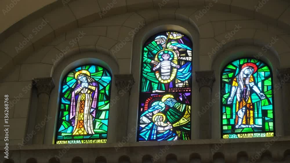 Multicolored stained glass church window illustrated Bible stories ...