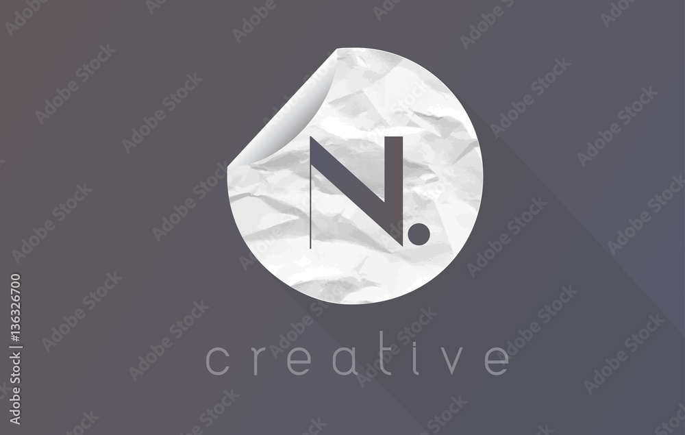N Letter Logo with Crumpled And Torn Wrapping Paper Texture. Stock ...