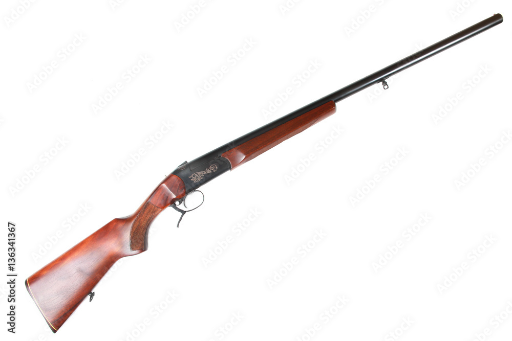 Old Soviet 12-gauge single-barreled hunting gun isolated on a white ...