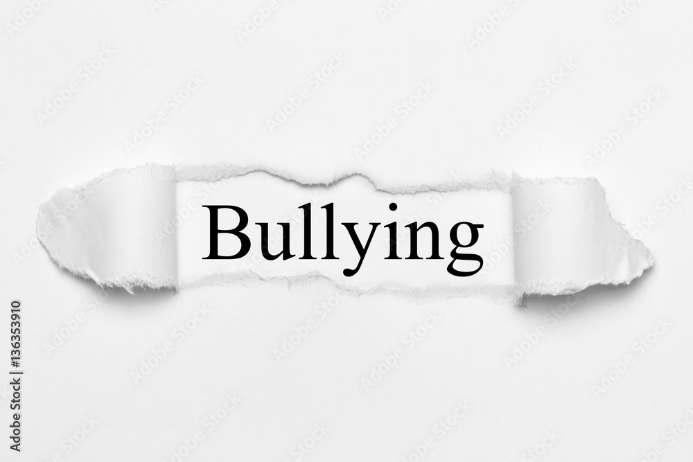 Bullying on white torn paper Stock Photo | Adobe Stock