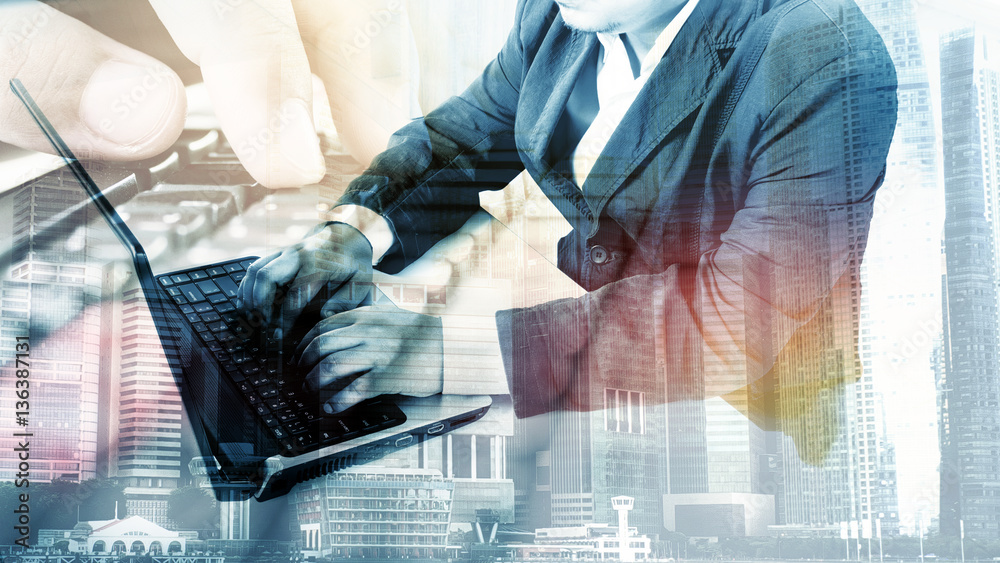 Double exposure of success businessman using Laptop with businessman ...