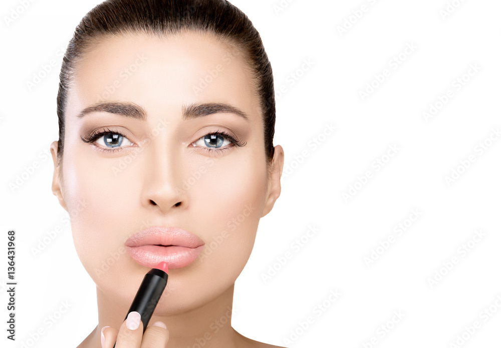 Gorgeous beauty model applying lipstick Stock Photo | Adobe Stock