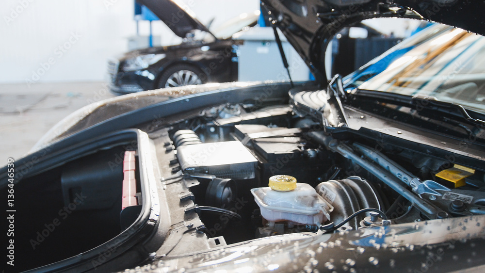 Automobile garage - hood of luxury sport car Stock Photo | Adobe Stock