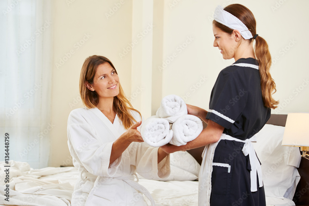 Room service bringing fresh towels Stock Photo | Adobe Stock