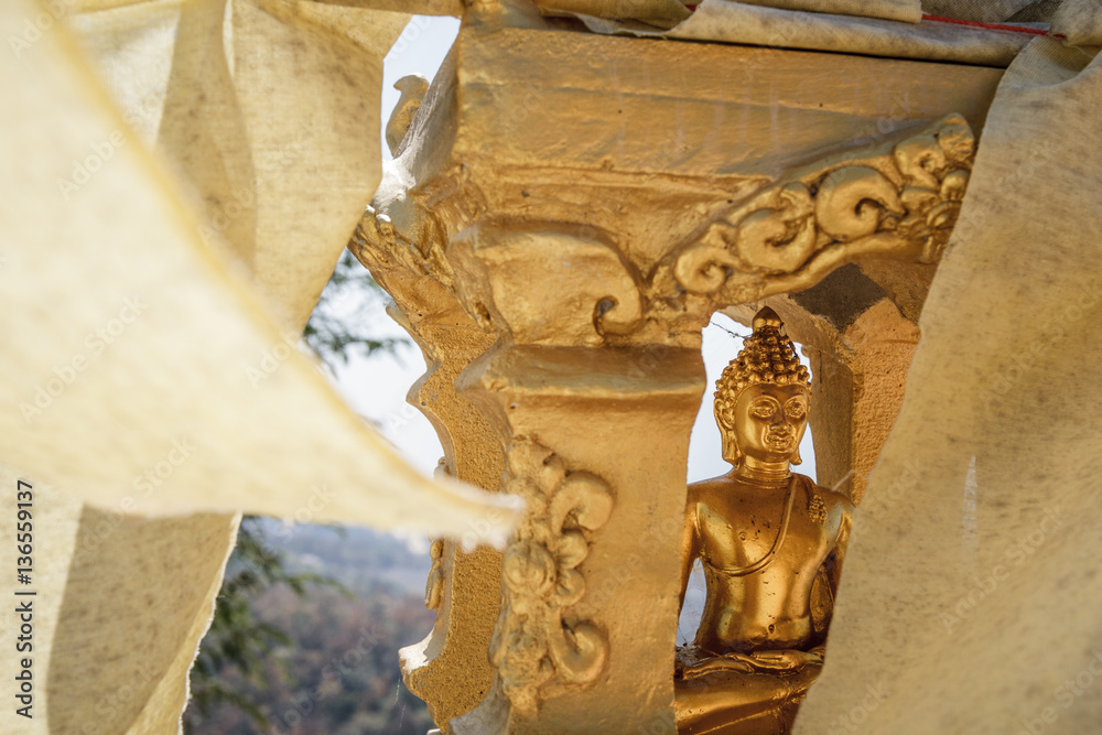 Amazing gold Buddha statue in golden recess made in carved gold with ...