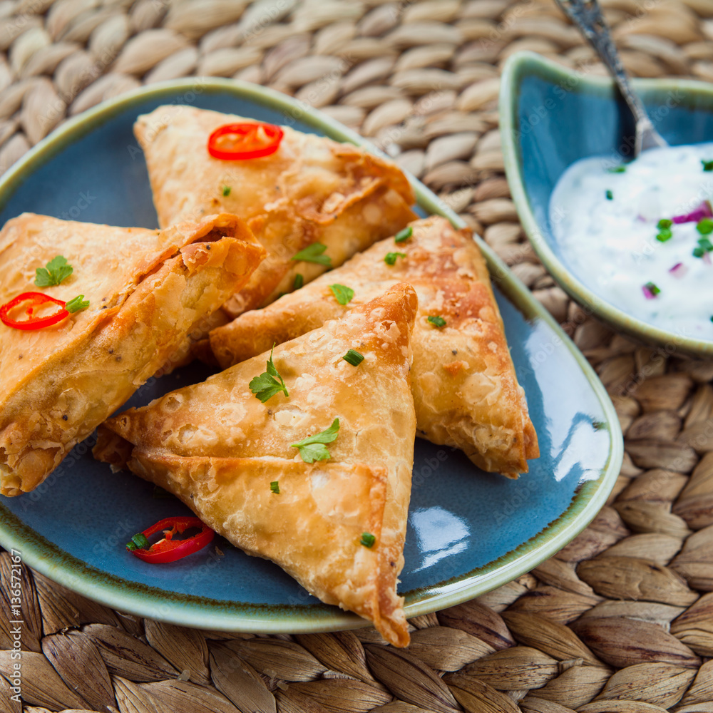 Indian Spicy Vegetable samosa with Mint Yoghurt Raita. Stock Photo ...