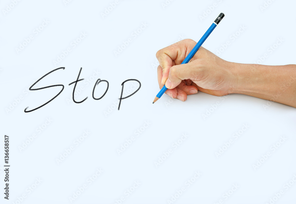 Hand holding a pencil on a white paper background, writing with pencil ...