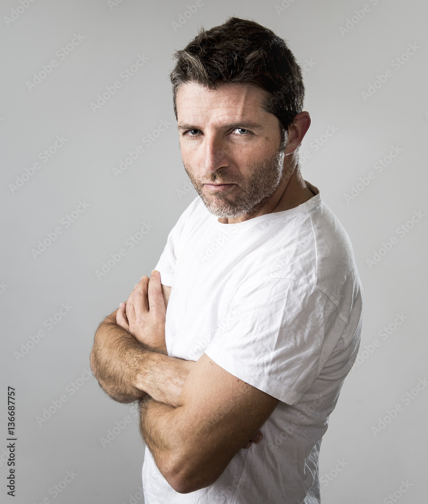young attractive man with blue eyes looking angry and mad in rag Stock ...
