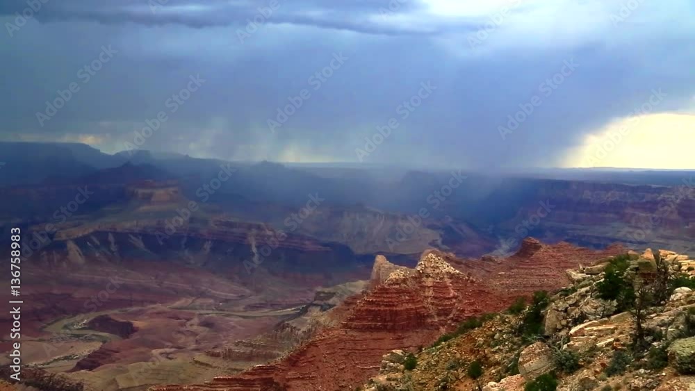 Storm and dark clouds at The Grand Canyon. The Colorado River carved ...