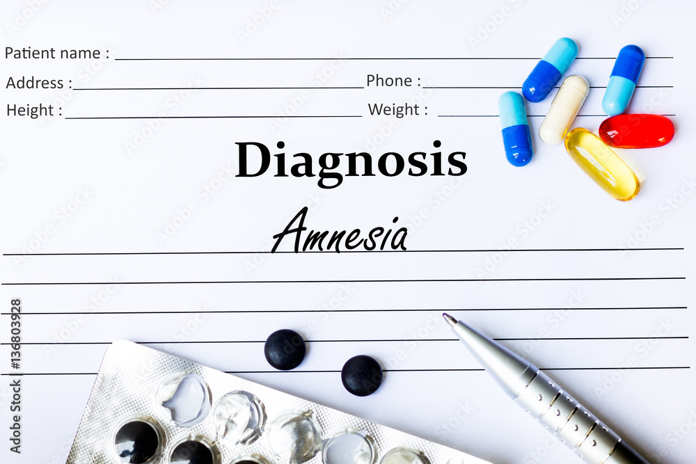 Amnesia - Diagnosis written on a piece of white paper with medication ...