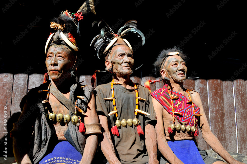 Warriors from the tribe of Konyak headhunters in the Nagaland state ...