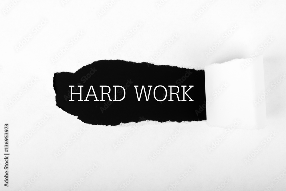 Paper torn and motivational text hard work Stock Photo | Adobe Stock