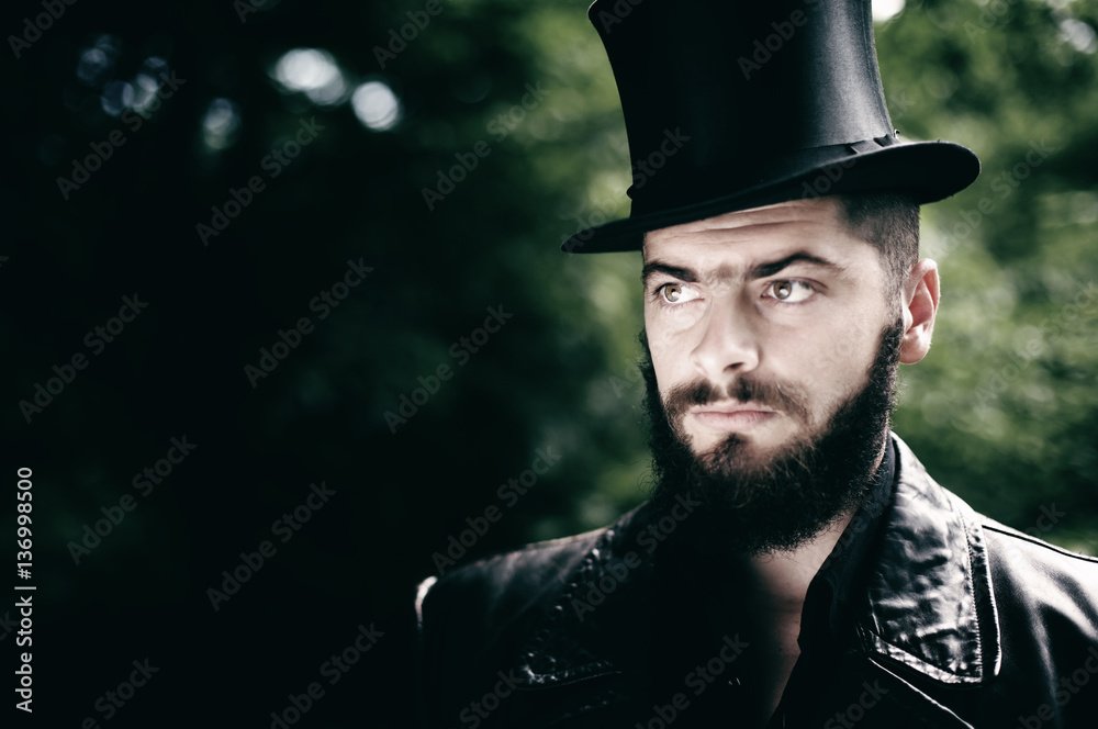 attractive young man with a beard and mustache Stock Photo | Adobe Stock