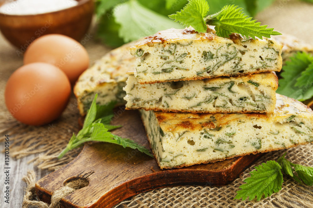 Pie with nettle Stock Photo | Adobe Stock