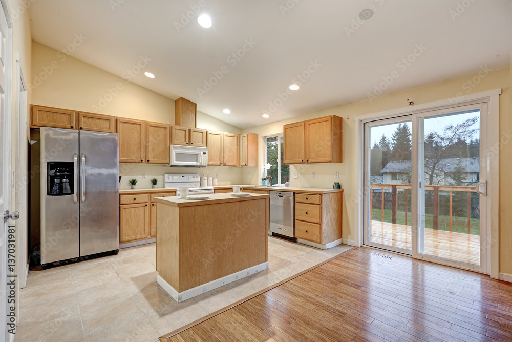 Light open concept kitchen room with vaulted ceiling Stock Photo ...