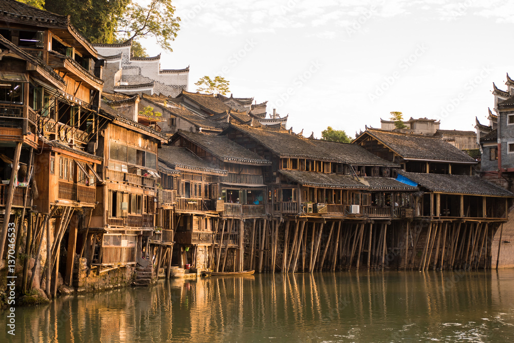 Foto de Photo of Historic Asian Village. Wooden Houses Above the Water ...