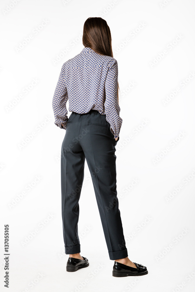 Details of women's clothing. Women's pants model on a white background ...