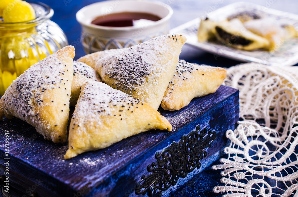 Triangular cookies with poppy seeds Stock Photo | Adobe Stock