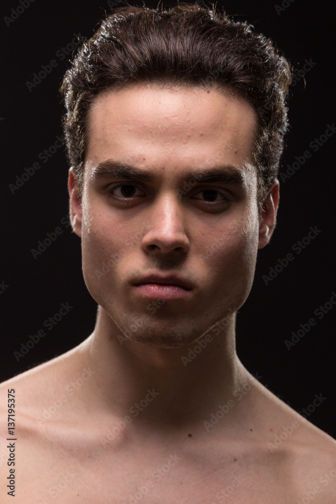 intense angry young man head face closeup jawline Stock Photo | Adobe Stock