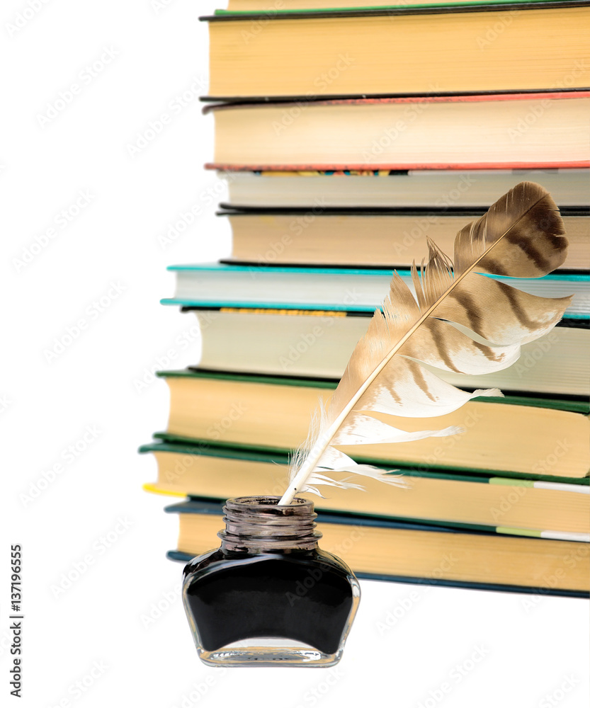 ink, pen and stack of books on a white background Stock Photo | Adobe Stock