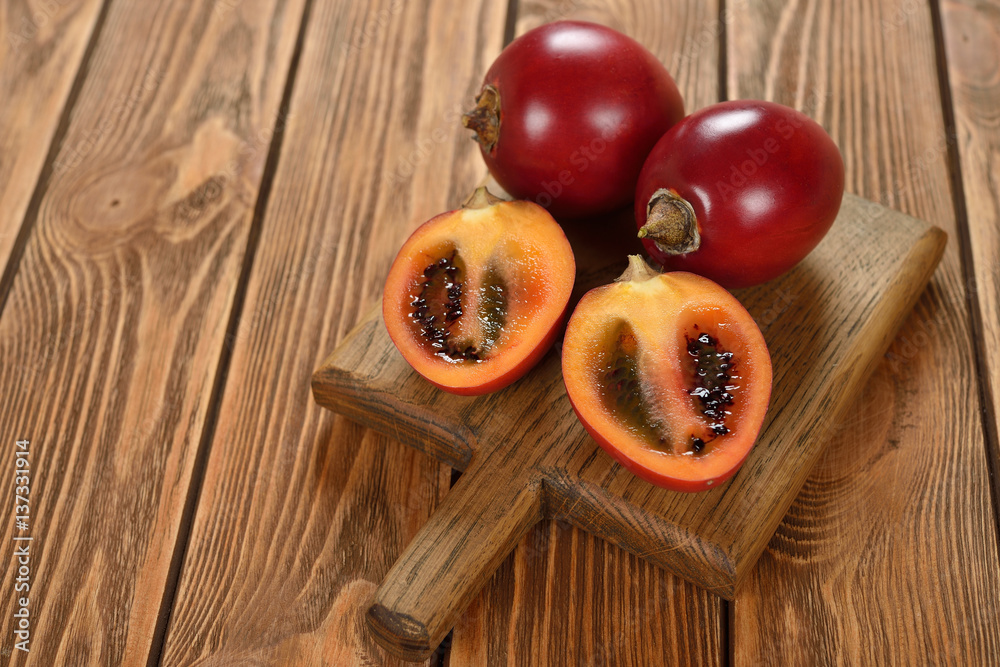 Exotic fruit tamarillo Stock Photo | Adobe Stock