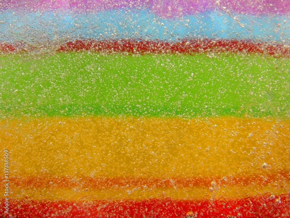 Colorful ice background. Abstract texture of bubbles in ice. Spectral ...