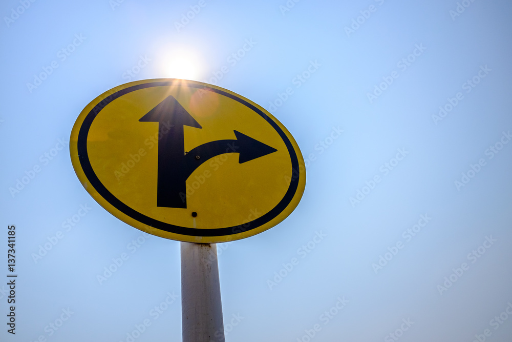 Traffic sign to go straight or turn right Stock-Foto | Adobe Stock