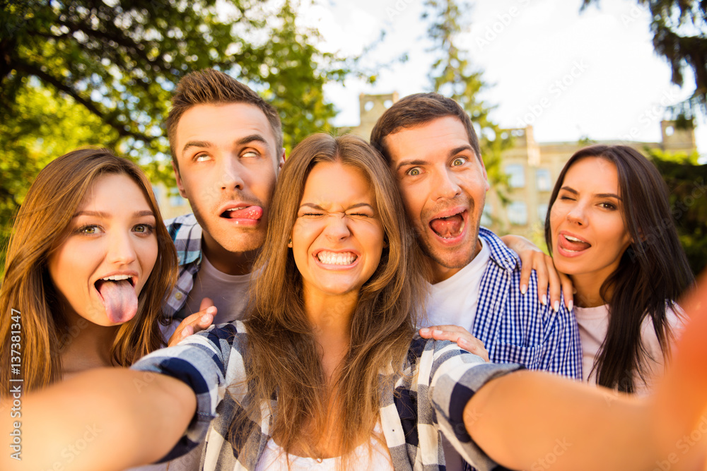 five crazy best friends fooling and making funny selfie photo Stock ...