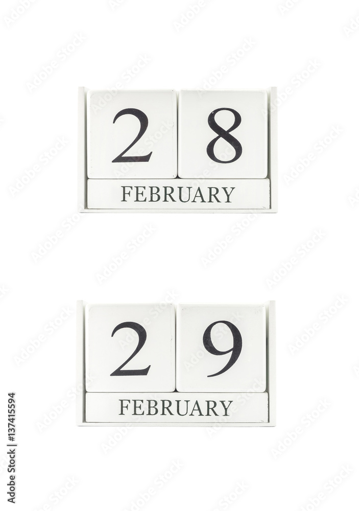 Closeup group of white wooden calendar with black 28 , 29 february word ...