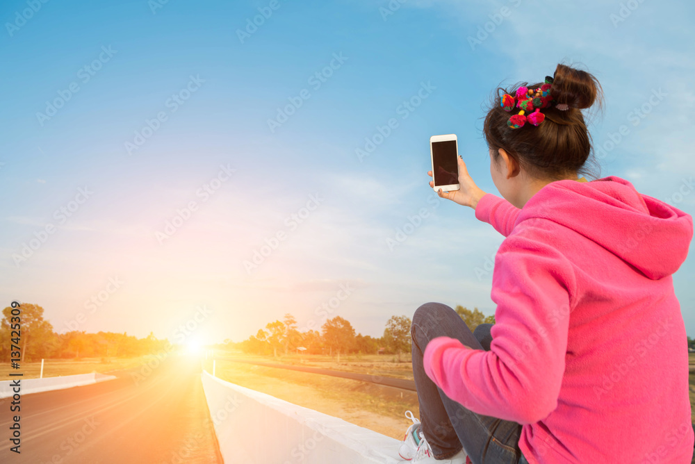 young women are beautiful selfie sky at sunset Stock Photo | Adobe Stock