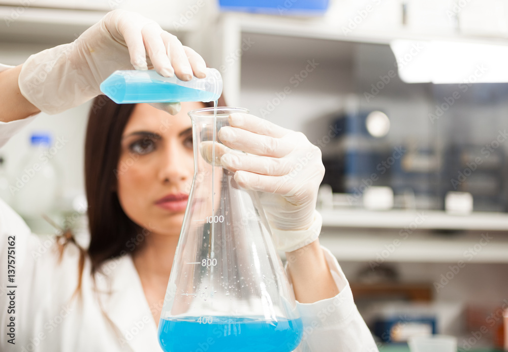 Researcher at work in a laboratory Stock Photo | Adobe Stock
