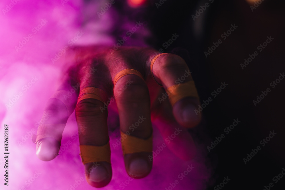 Hand in Pink Smoke Stock Photo | Adobe Stock