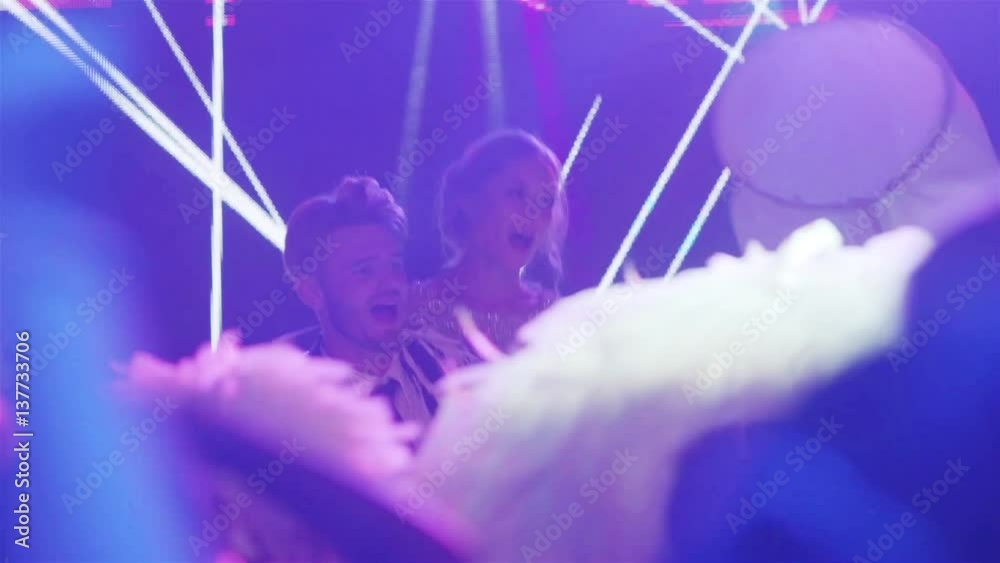 Masquerade night celebrate dancing man and woman on nightclub stage ...