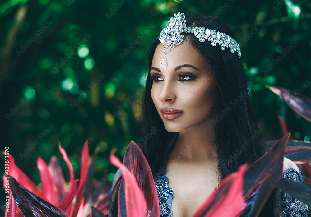 Beautiful queen girl with long hair and a crown on head Stock Photo ...