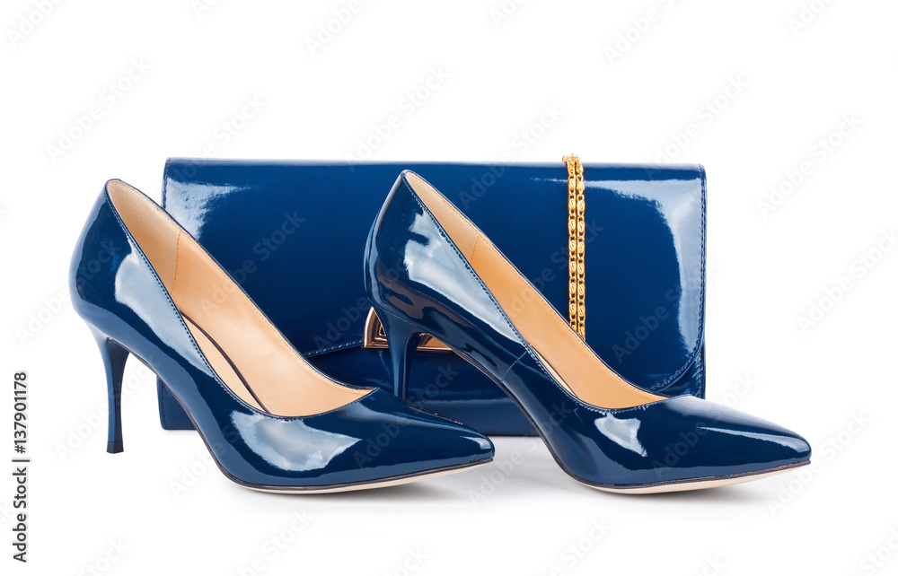 Beautiful blue shoes with clutches on isolated background Stock-Foto ...