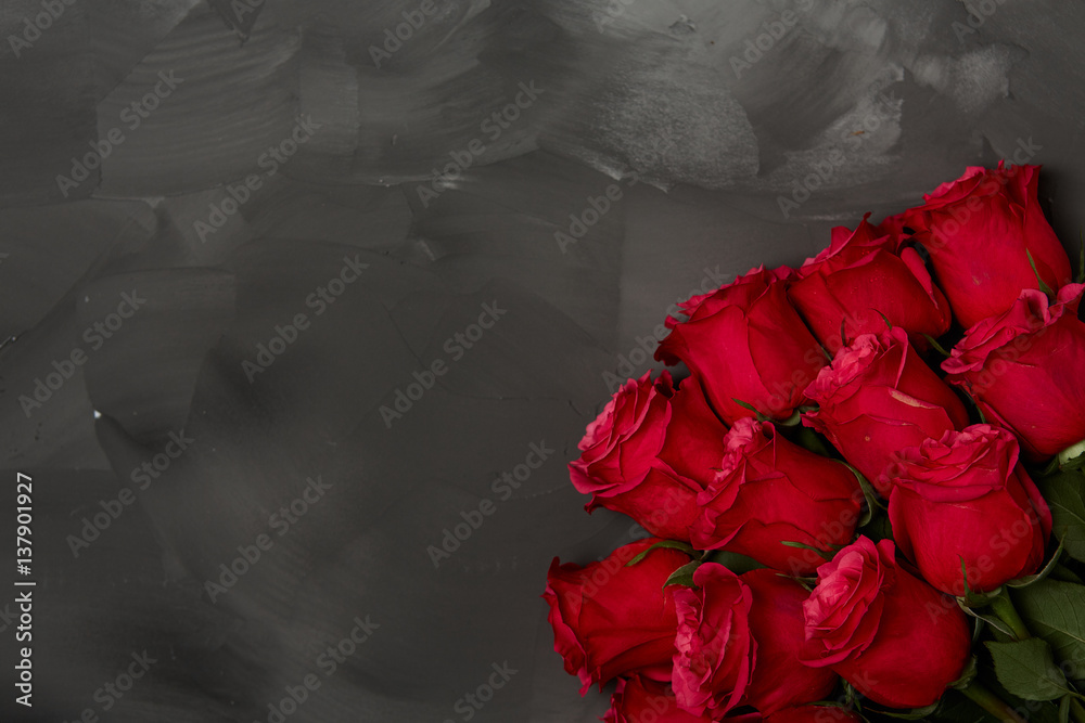 Composition of red roses on dark grey background. Romantic shabby chic ...