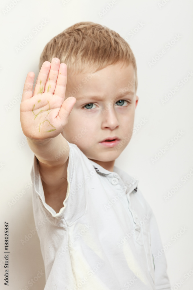 Kid show stop gesture with outsretched arm. Stock Photo | Adobe Stock