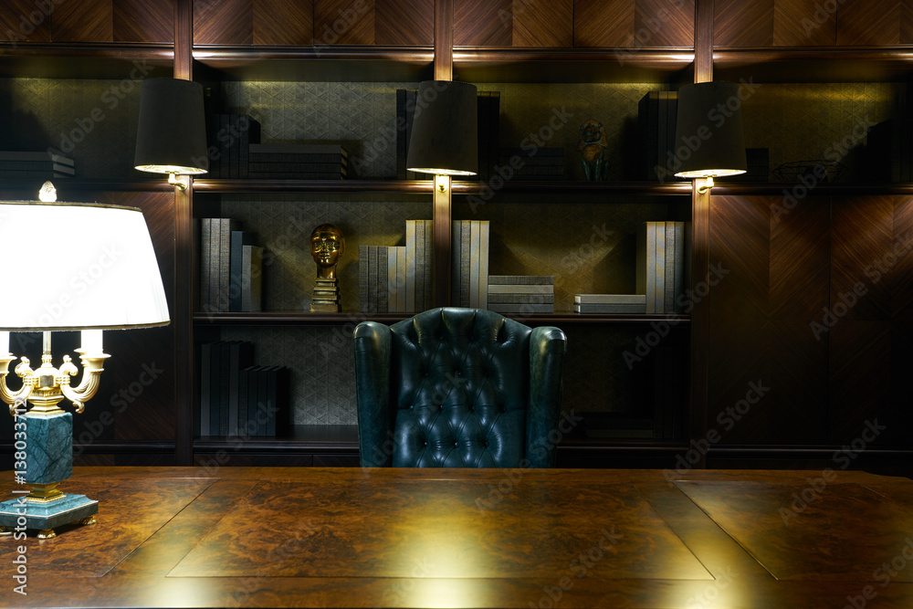 Private office.Spacious dark wood home office in classical style with ...