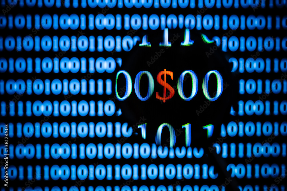 Computer screen with binary code all around. Magnifying glass zooming ...