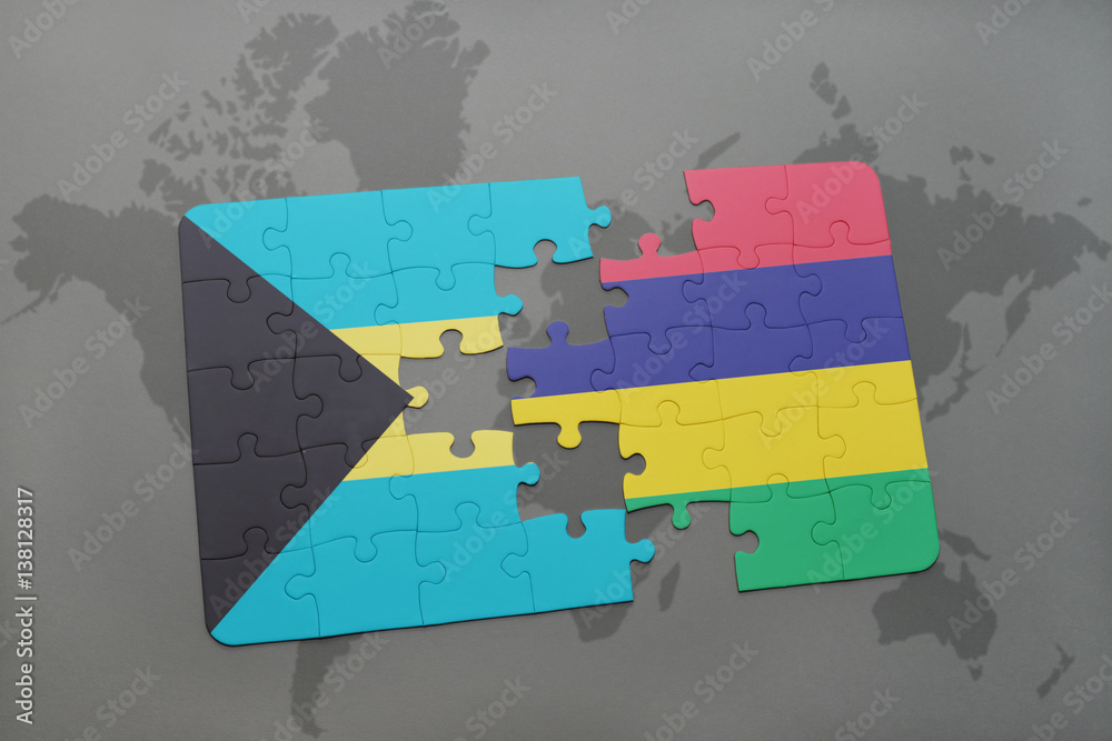 puzzle with the national flag of bahamas and mauritius on a world map ...