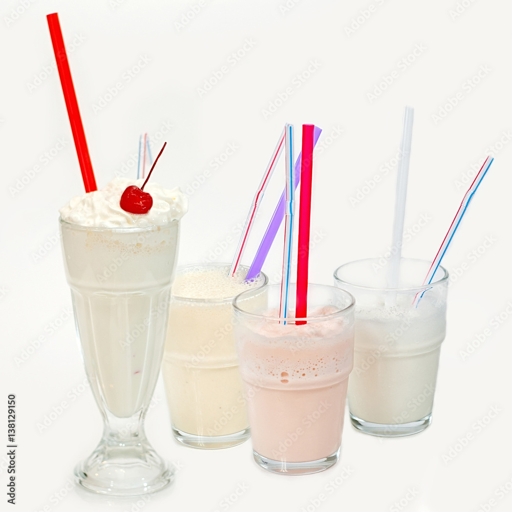 milkshake with a straw in a glass5 Stock Photo | Adobe Stock