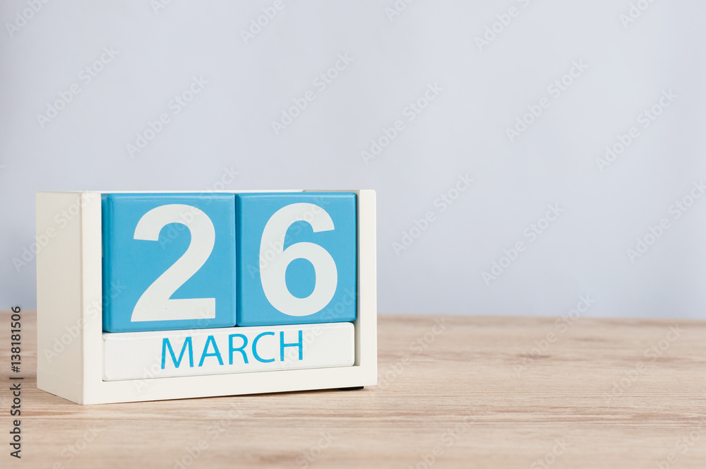 March 26th. Day 26 of month, wooden color calendar on table background ...